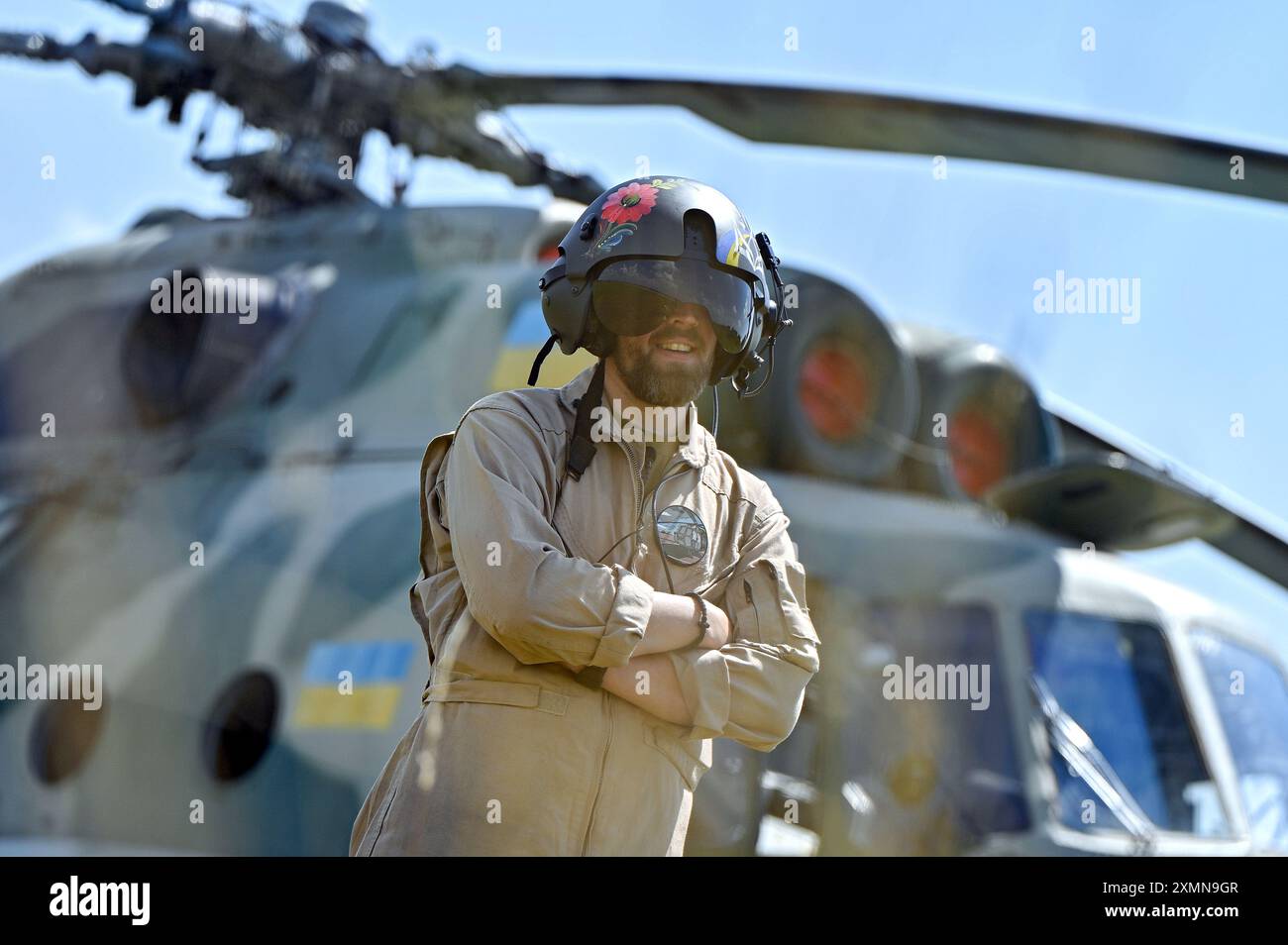 UKRAINE - JULY 11, 2024 - A flight engineer stands by a Mi-8MSB-V ...