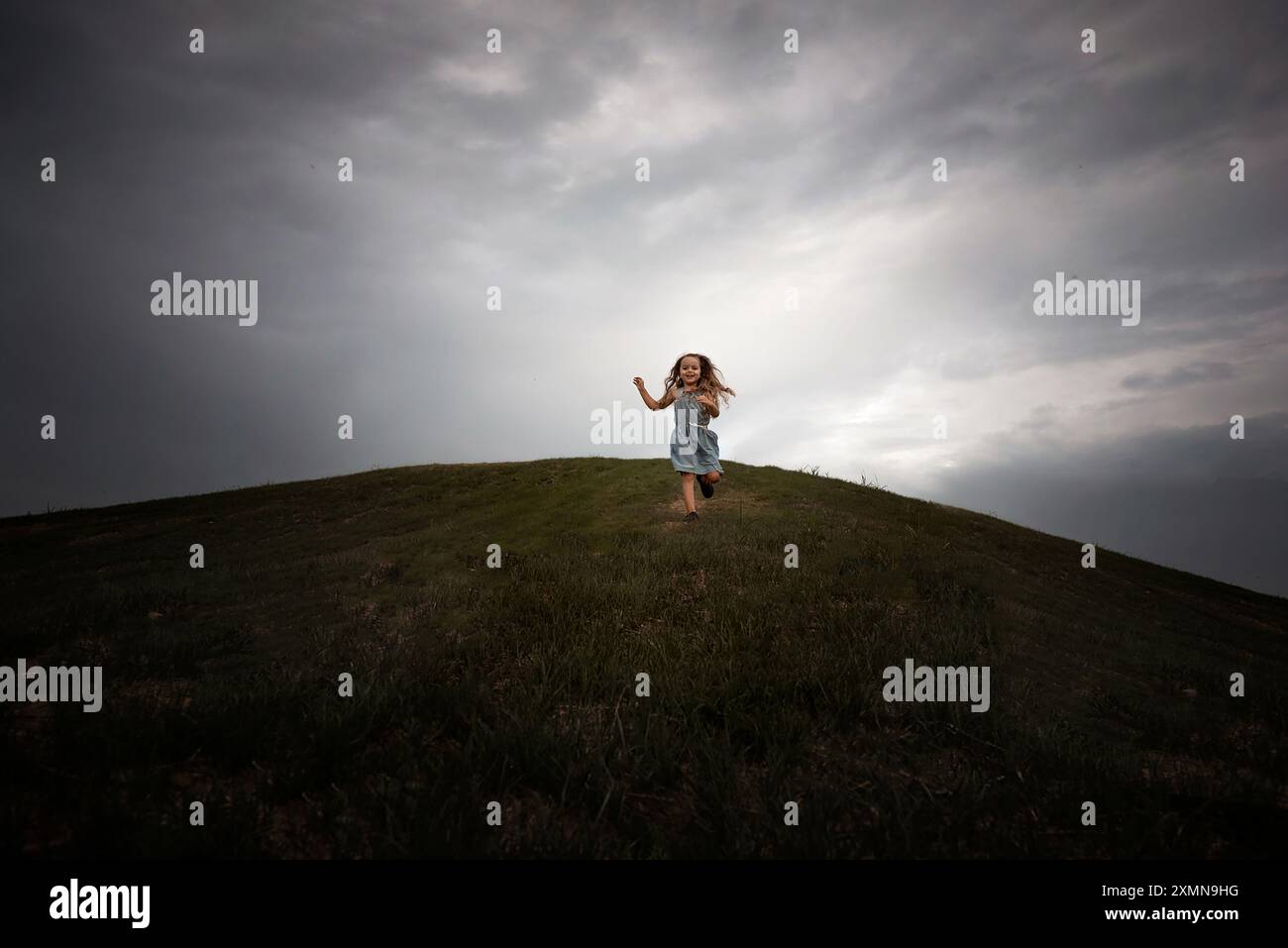 Running girl low angle hi-res stock photography and images - Alamy