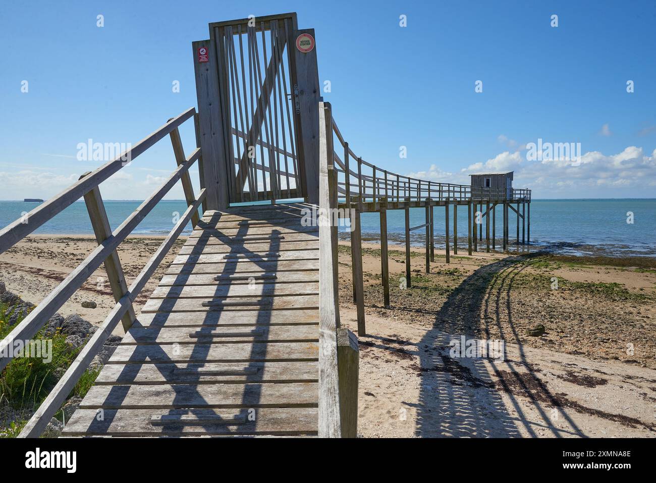 Square net fishing on stilts at the charente coast Stock Photo - Alamy