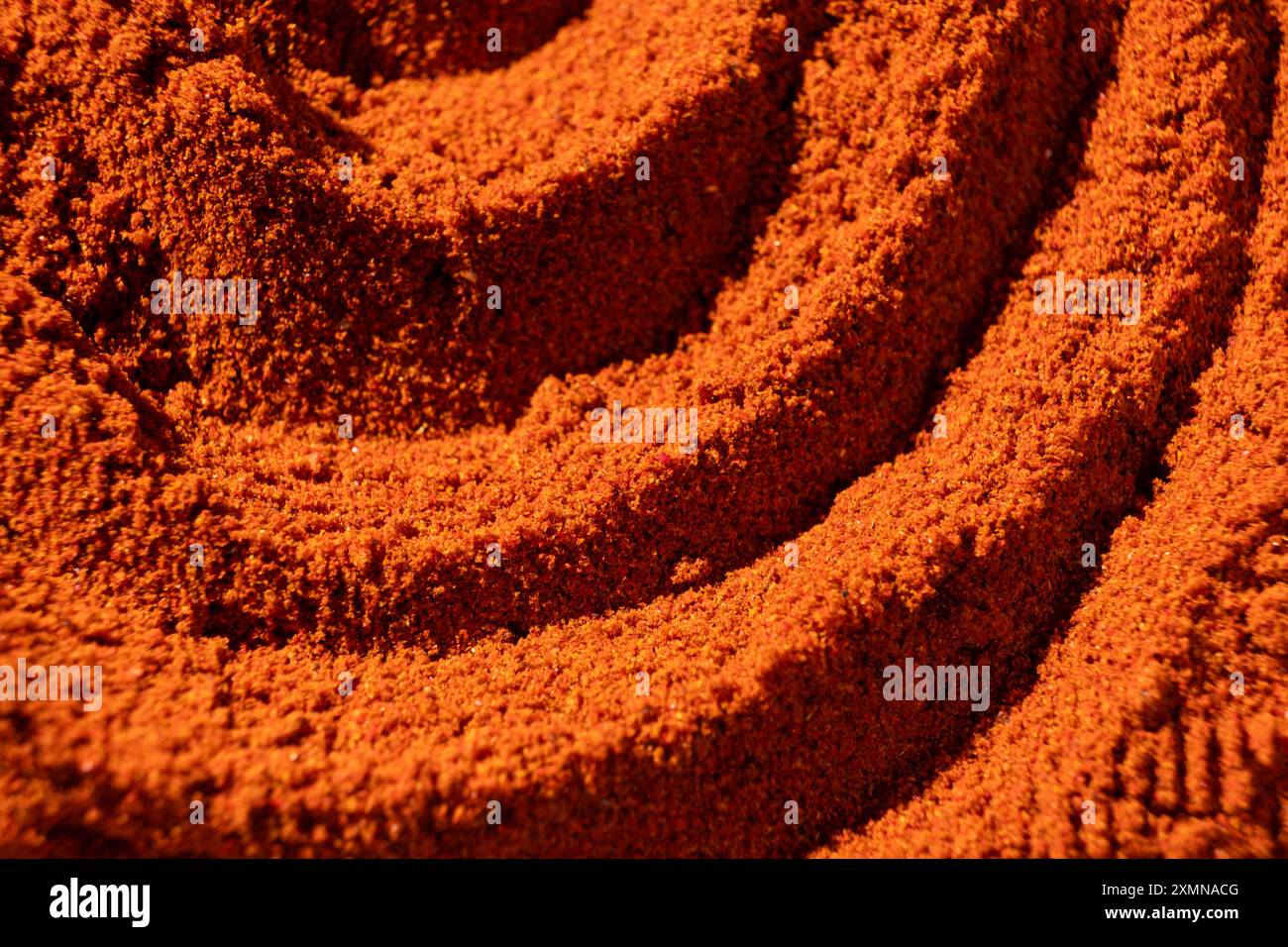 Ground paprika, red terracotta spice background, art in cooking Stock ...