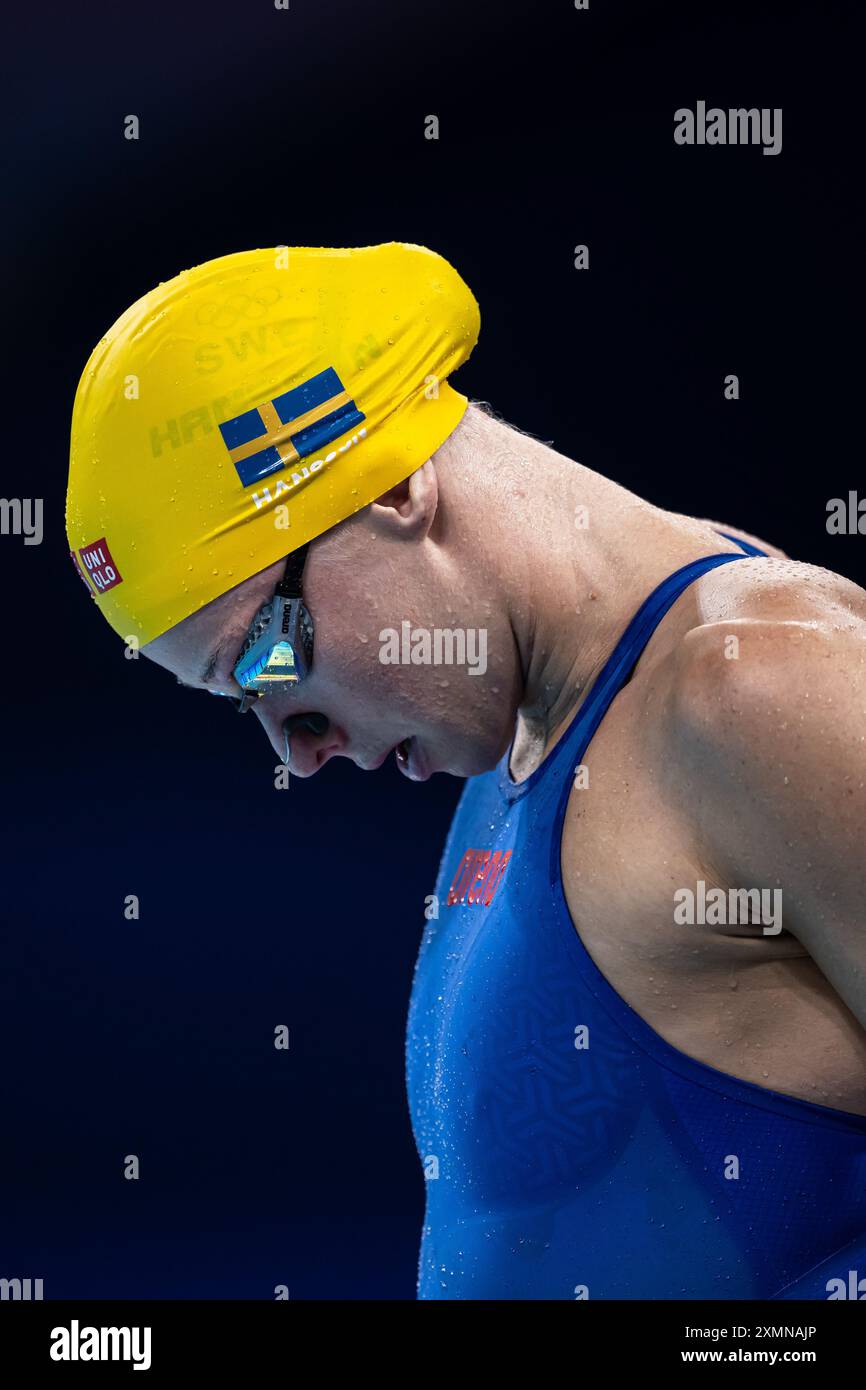 Louise Hansson of, Sweden. , . ahead of the women's 100 meters backstroke swimming heats during ...