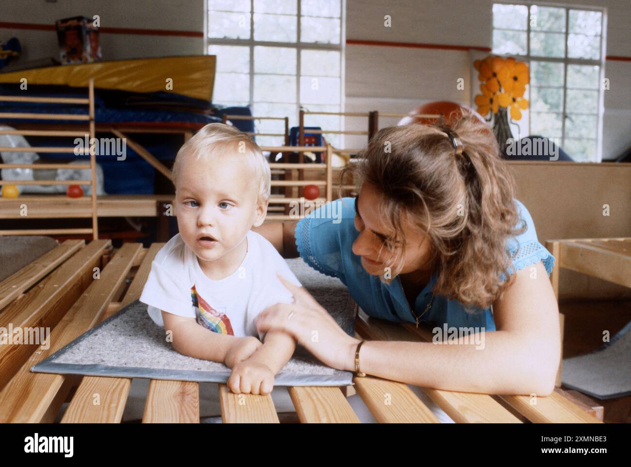 A carer and a patient at cerebral palsy therapy centre The Rainbow ...
