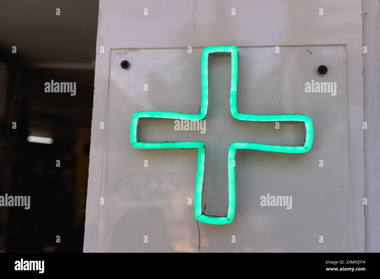 Green neon cross Photography of a green cross, the symbol used for ...