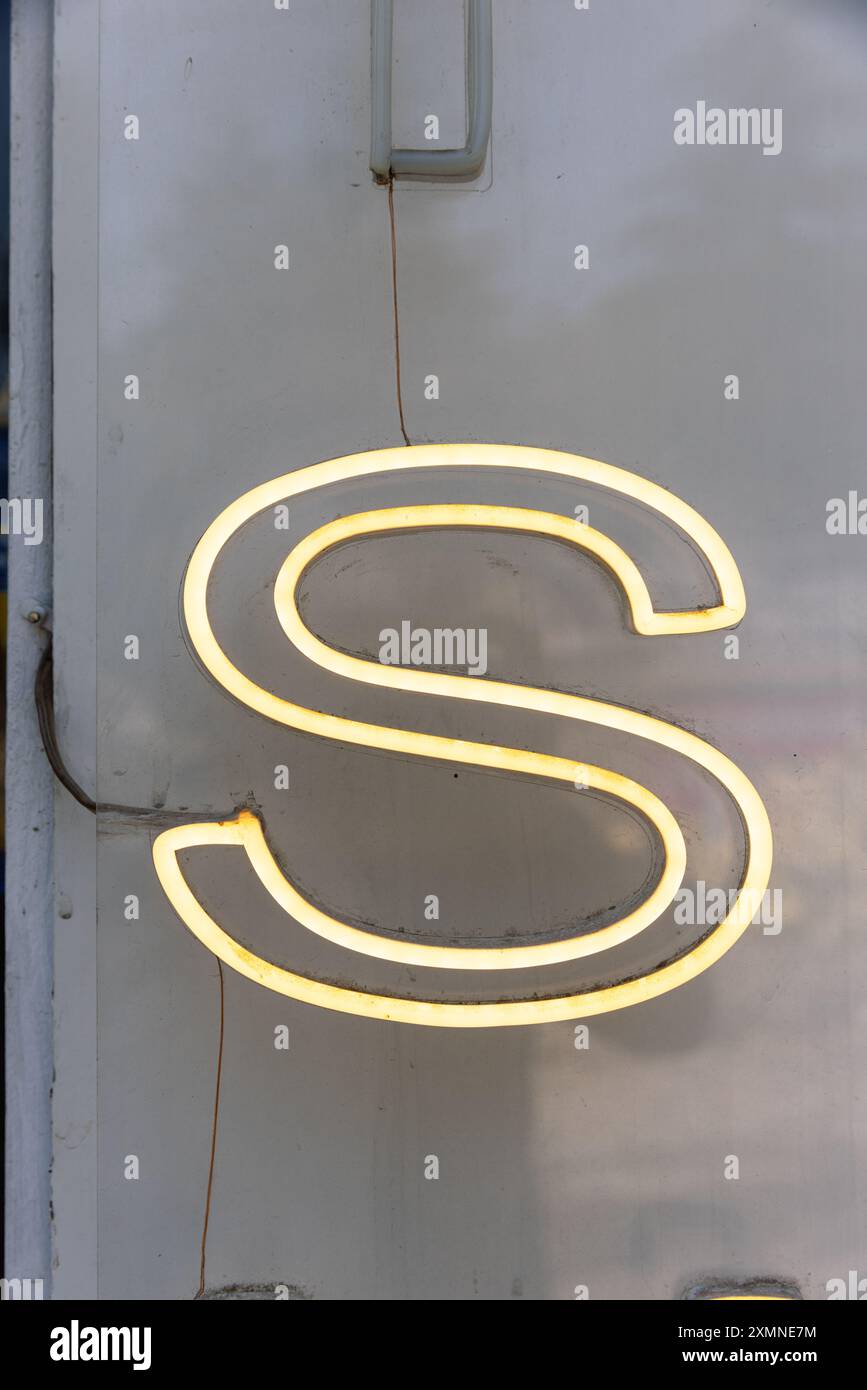 neon capital letter S lighted up. background. High quality photo Stock ...