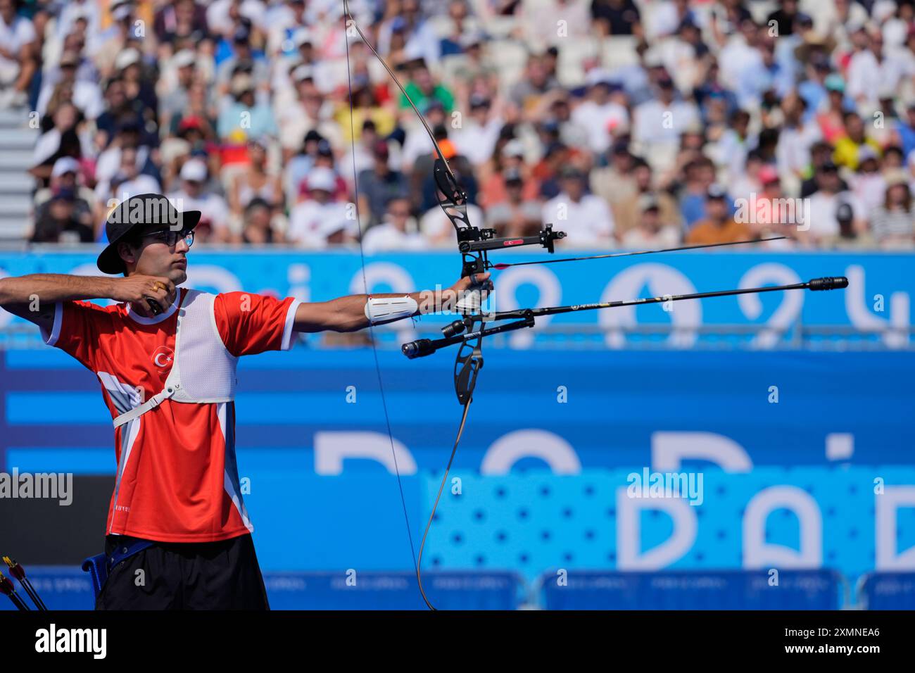 Turkey's Abdullah Yildirmis releases his arrow in the men's team ...