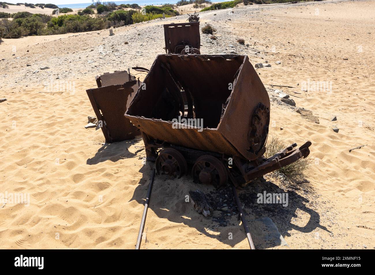 Decayed Mining Carts on Sardinian Beach Stock Photo - Alamy