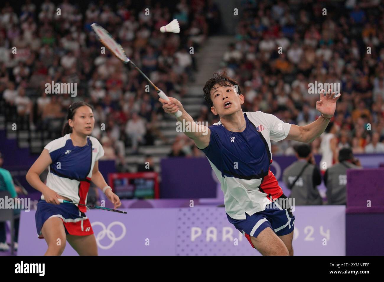 United States' Vinson Chiu and Jennie Gai play against Singapore's ...