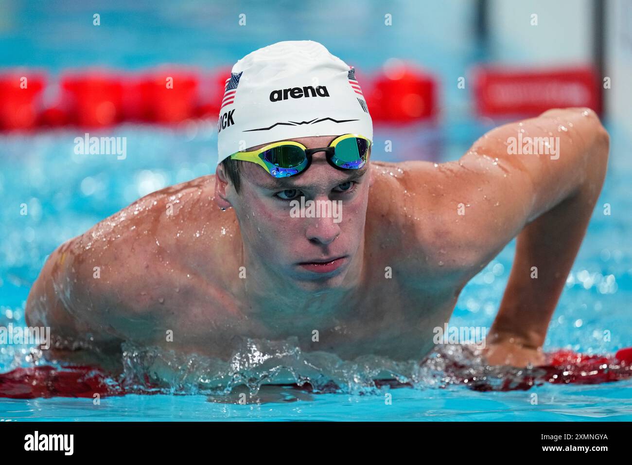 Luke Whitlock, of the United States, leaves the pool following his heat ...