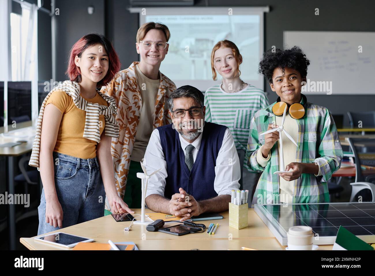 Group portrait of mature teacher of Environmental Education and multi ...