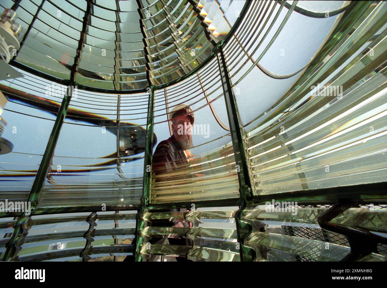 Lighthouse keeper Dermot Cronin looks through the lens of Britain's ...