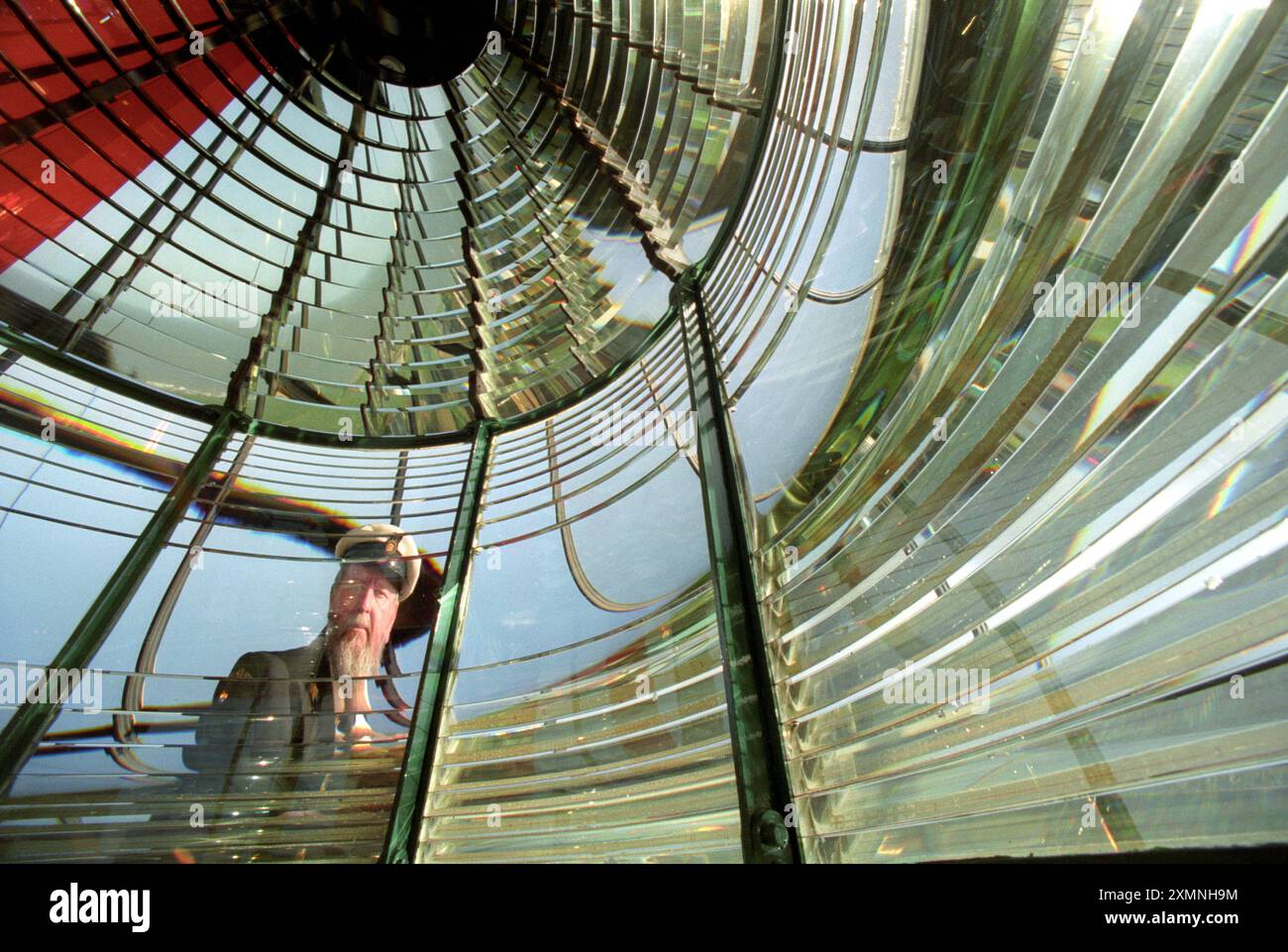 Lighthouse keeper Dermot Cronin looks through the lens of Britain's ...