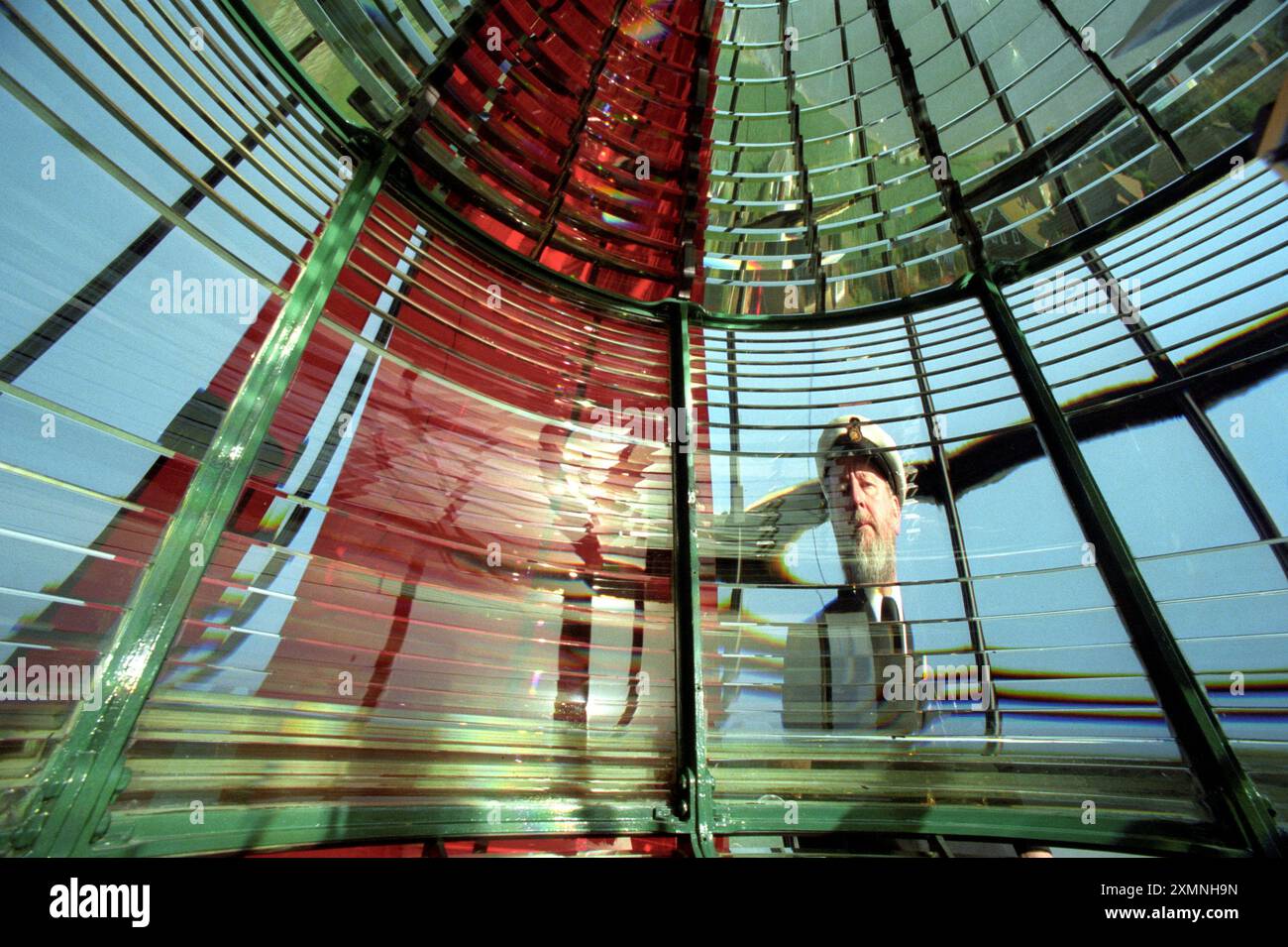 Lighthouse keeper Dermot Cronin looks through the lens of Britain's ...