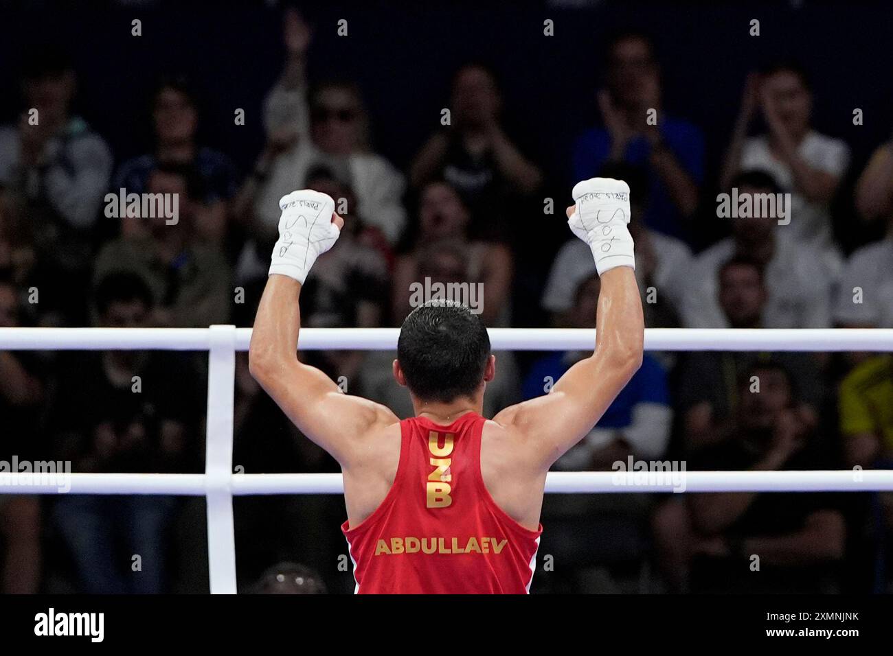 Uzbekistan's Ruslan Abdullaev celebrates after defeating Mexico's ...