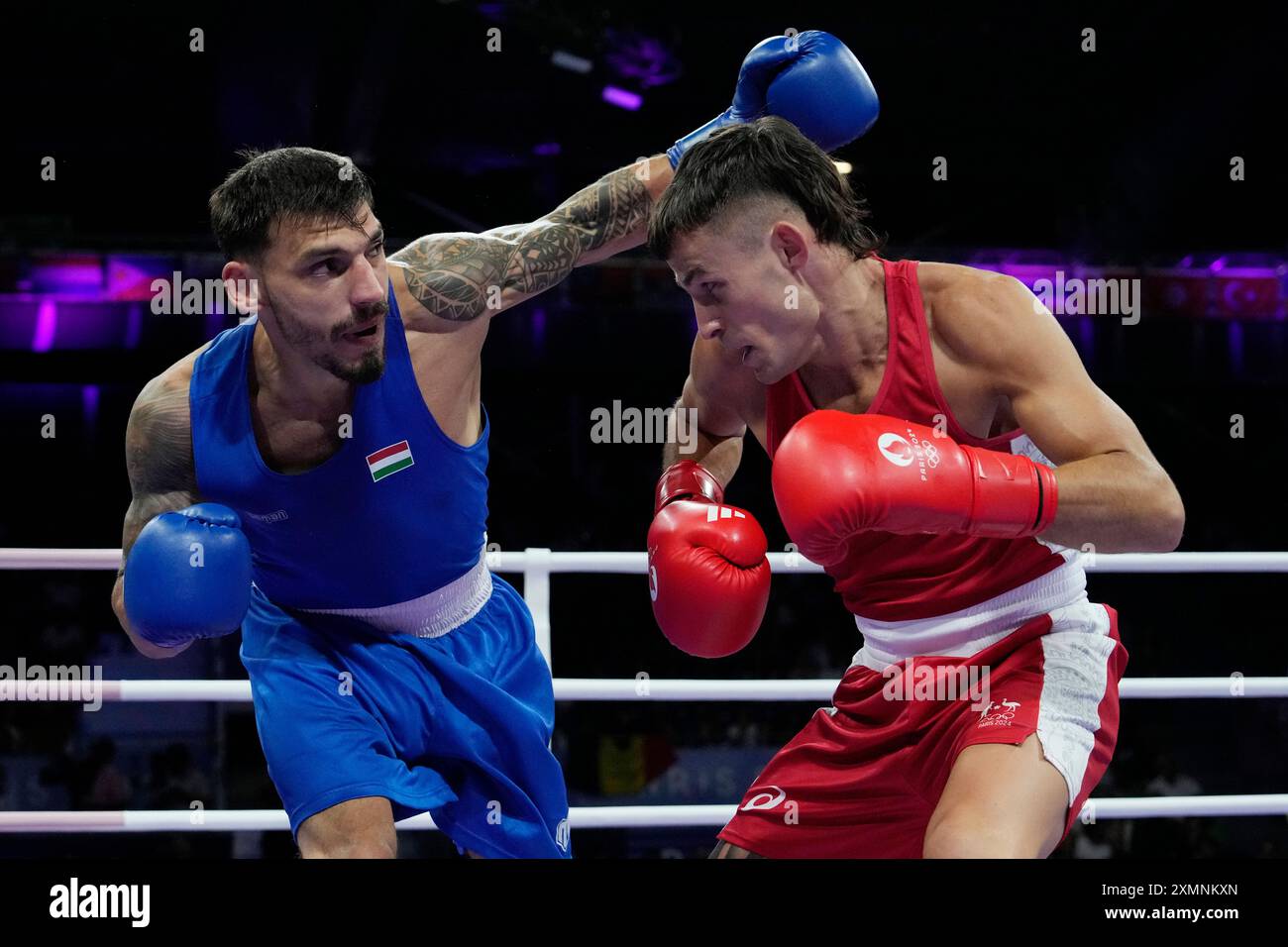 Australia's Harry Garside, right, fights Hungary's Richard Kovacs in ...