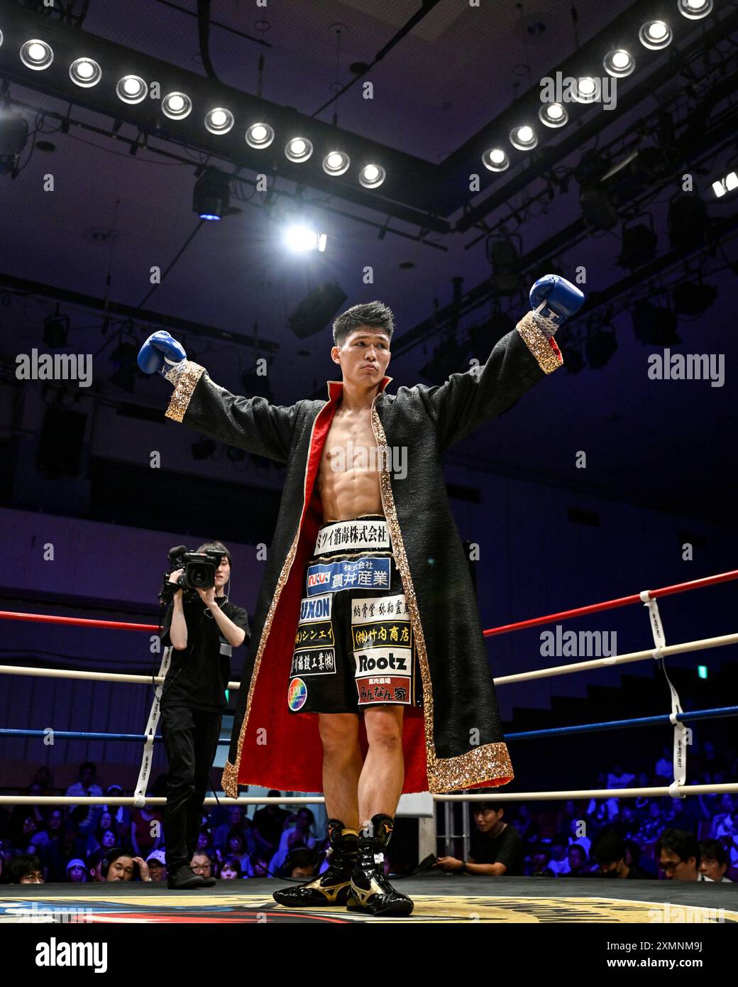 Tokyo, Japan. 19th July, 2024. Shu Utsuki enters the ring before the OPBF lightweight bout at ...