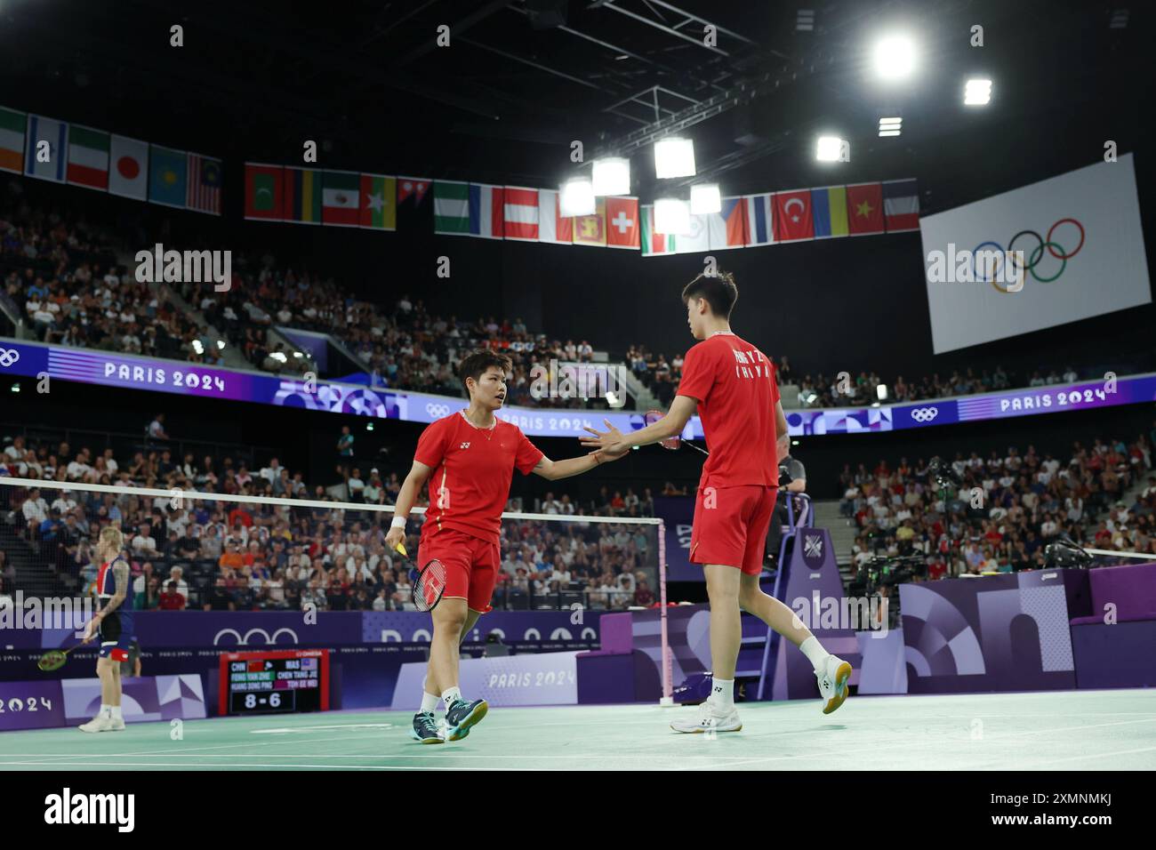 Paris, France. 29th July, 2024. Feng Yanzhe (R)/Huang Dongping of China react during the ...