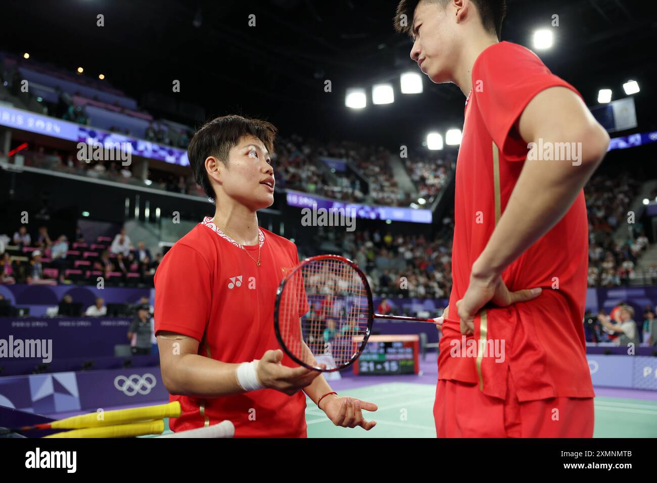 Paris, France. 29th July, 2024. Feng Yanzhe (R)/Huang Dongping of China react during the ...