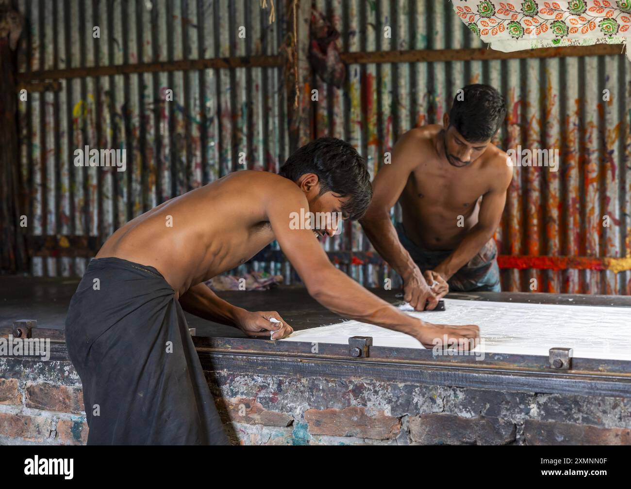 Bangladeshi workers making manual screen printing, Dhaka Division, Rupganj, Bangladesh Stock ...