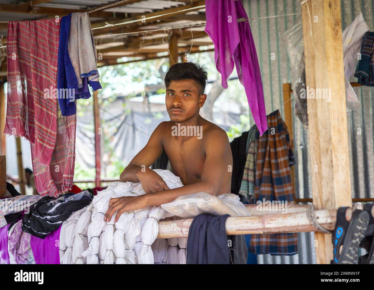 Bangladeshi man working in a batik factory, Dhaka Division, Rupganj ...