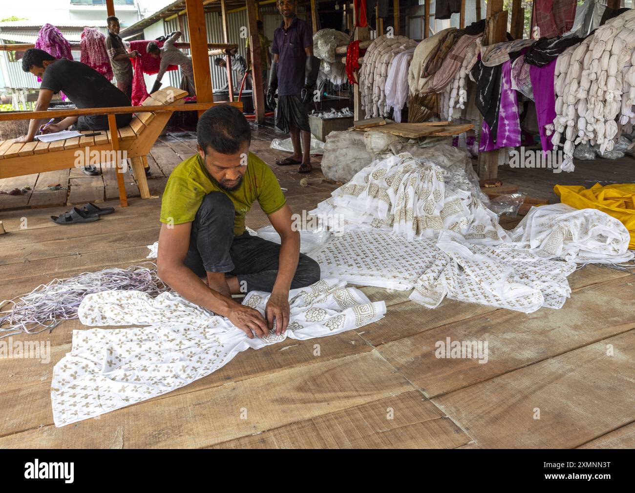 Bangladeshi man working in a batik factory, Dhaka Division, Rupganj, Bangladesh Stock Photo - Alamy
