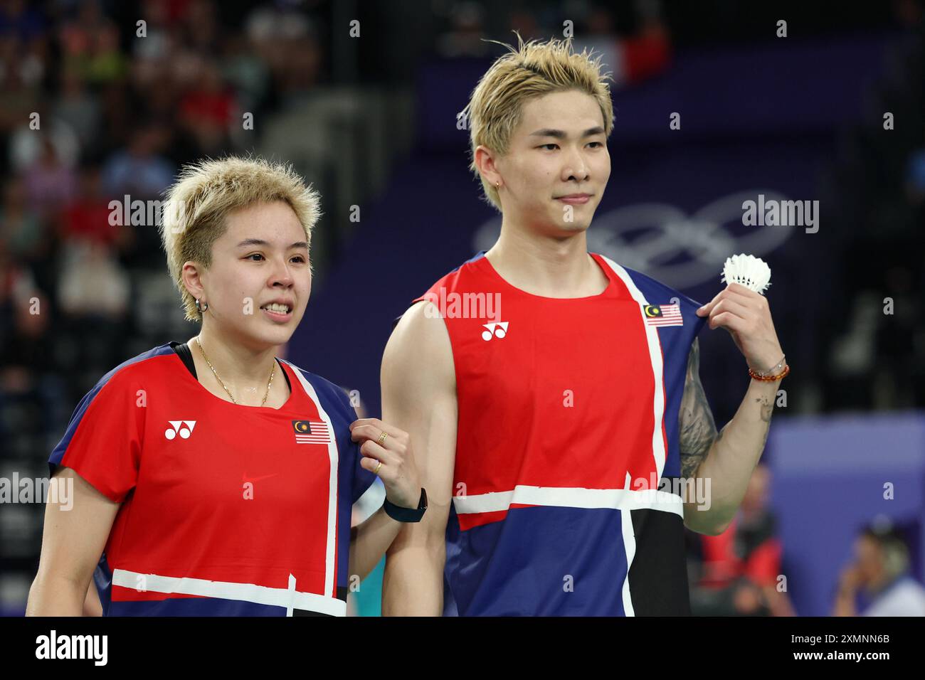 Paris, France. 29th July, 2024. Chen Tang Jie/Toh Ee Wei (L) of Malaysia pose for photos after ...