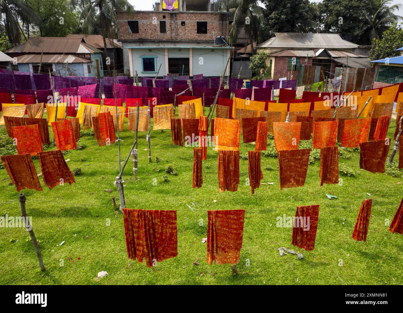 Drying fabrics under the sun, Dhaka Division, Rupganj, Bangladesh Stock ...