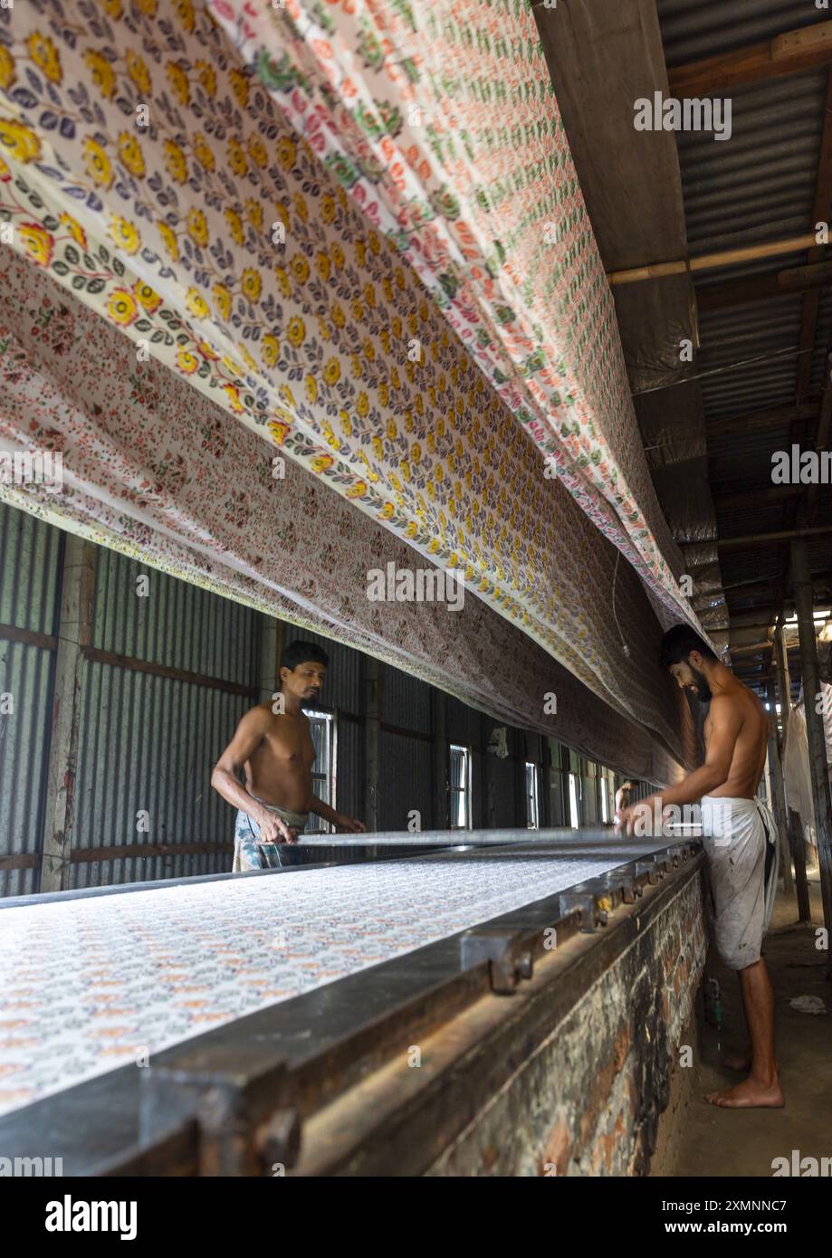 Bangladeshi workers making manual screen printing, Dhaka Division ...