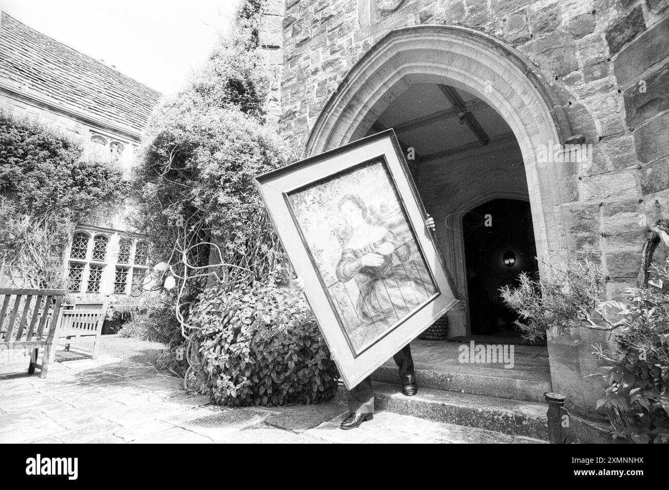 A Sotheby's porter carries a portrait of Anne , Countess of Rosse ...