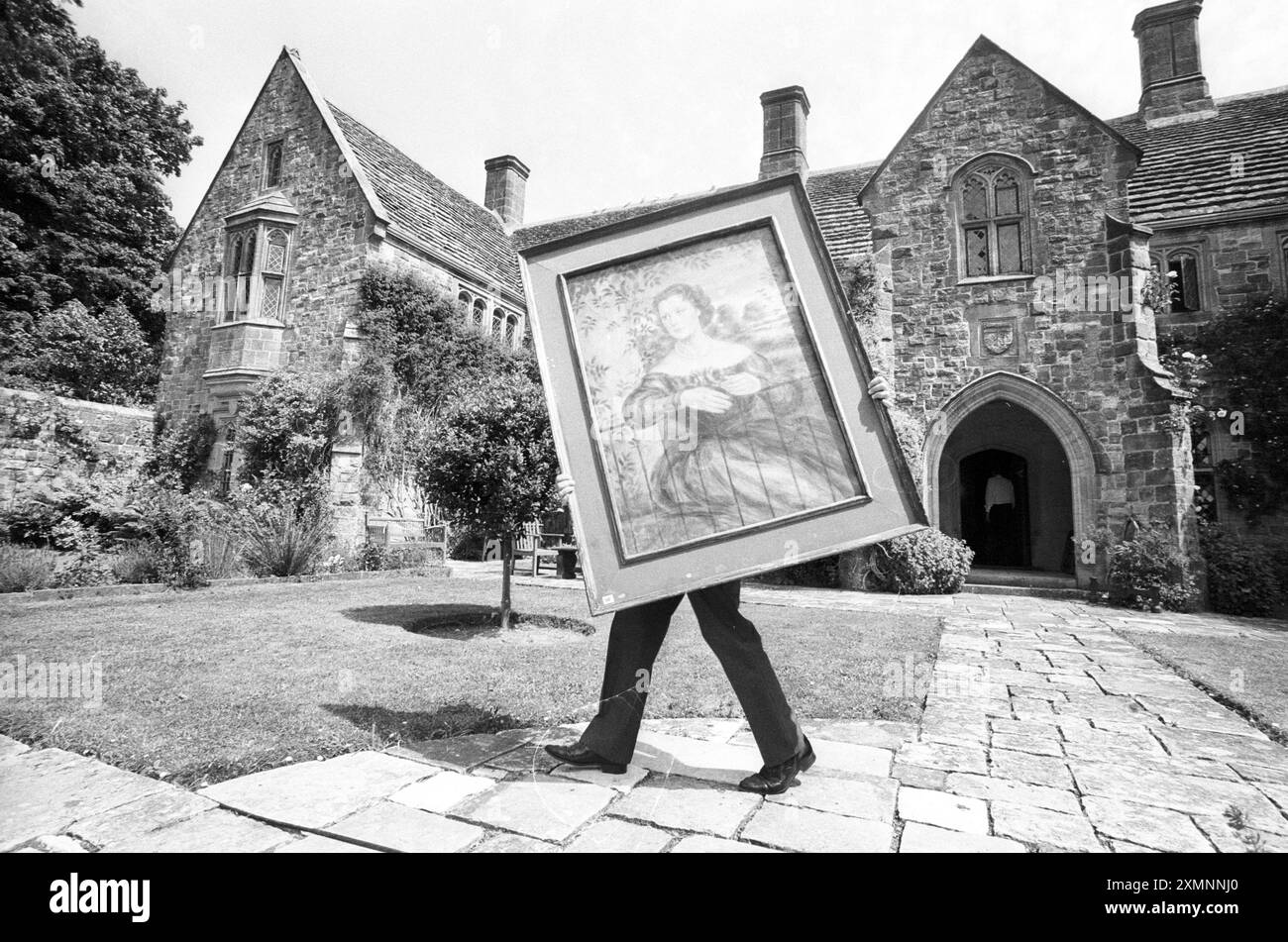 A Sotheby's porter carries a portrait of Anne , Countess of Rosse ...