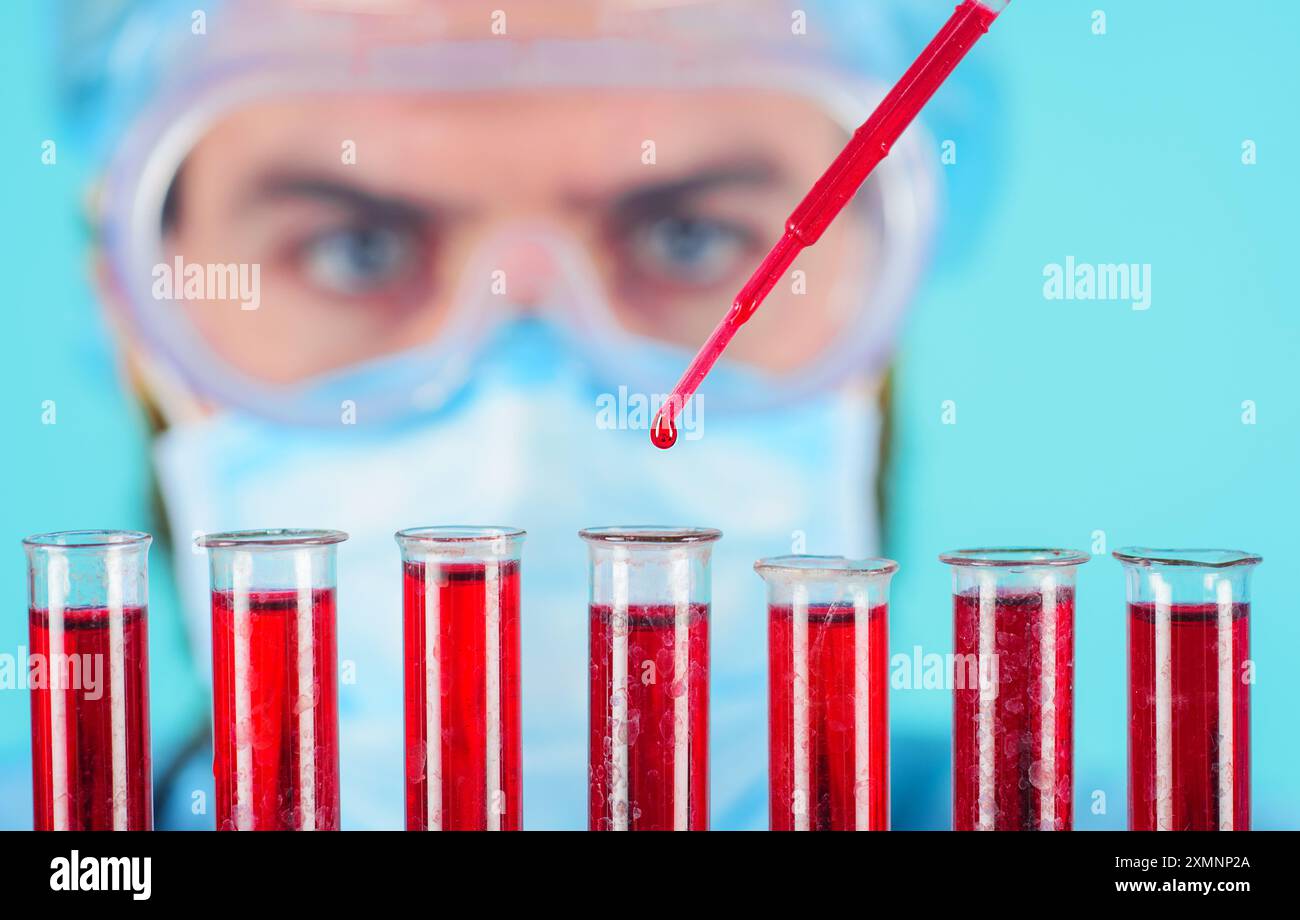 Blood test. Doctor working with patient's blood sample in lab ...
