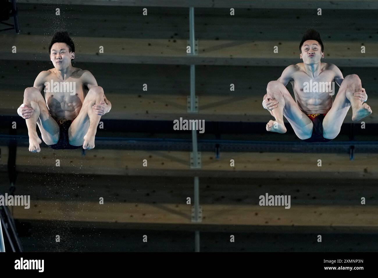 China's Lian Junjie and Yang Hao compete in the men's synchronised 10m ...