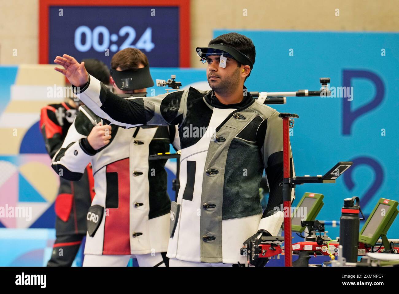 India's Arjun Babuta gestures after finishing fourth in the 10m air ...