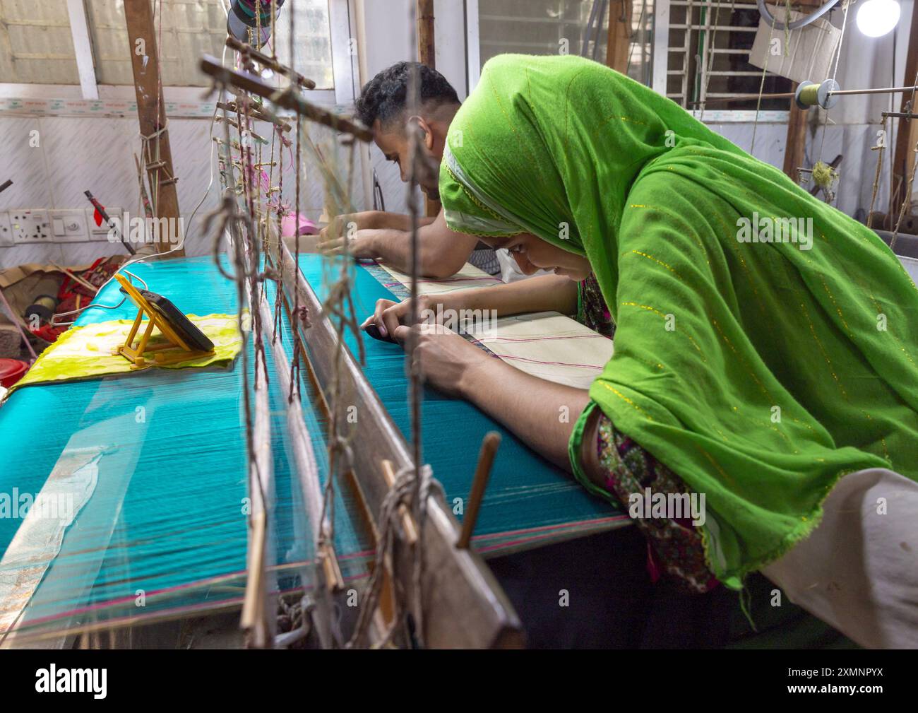 Bangladeshi people weaving in a sari factory, Dhaka Division, Rupganj, Bangladesh Stock Photo ...