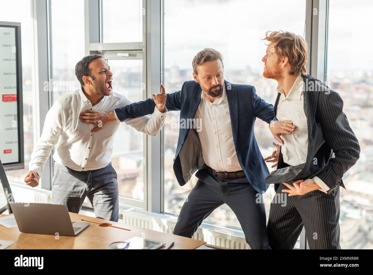 Three Men Arguing In A Modern Office During The Day Stock Photo - Alamy