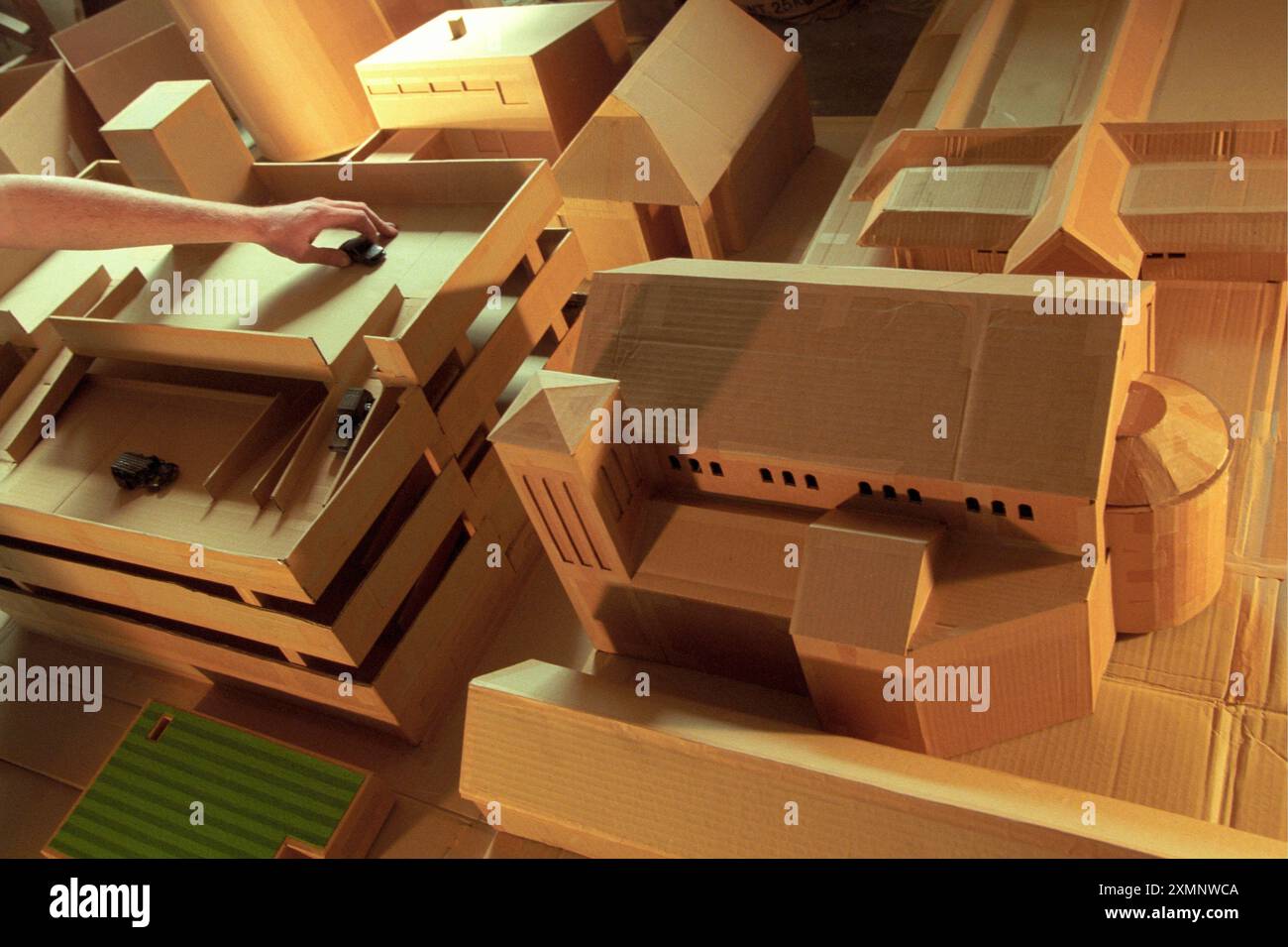 Matthew Miller curator of Fabrica Gallery, Brighton, installing a ...