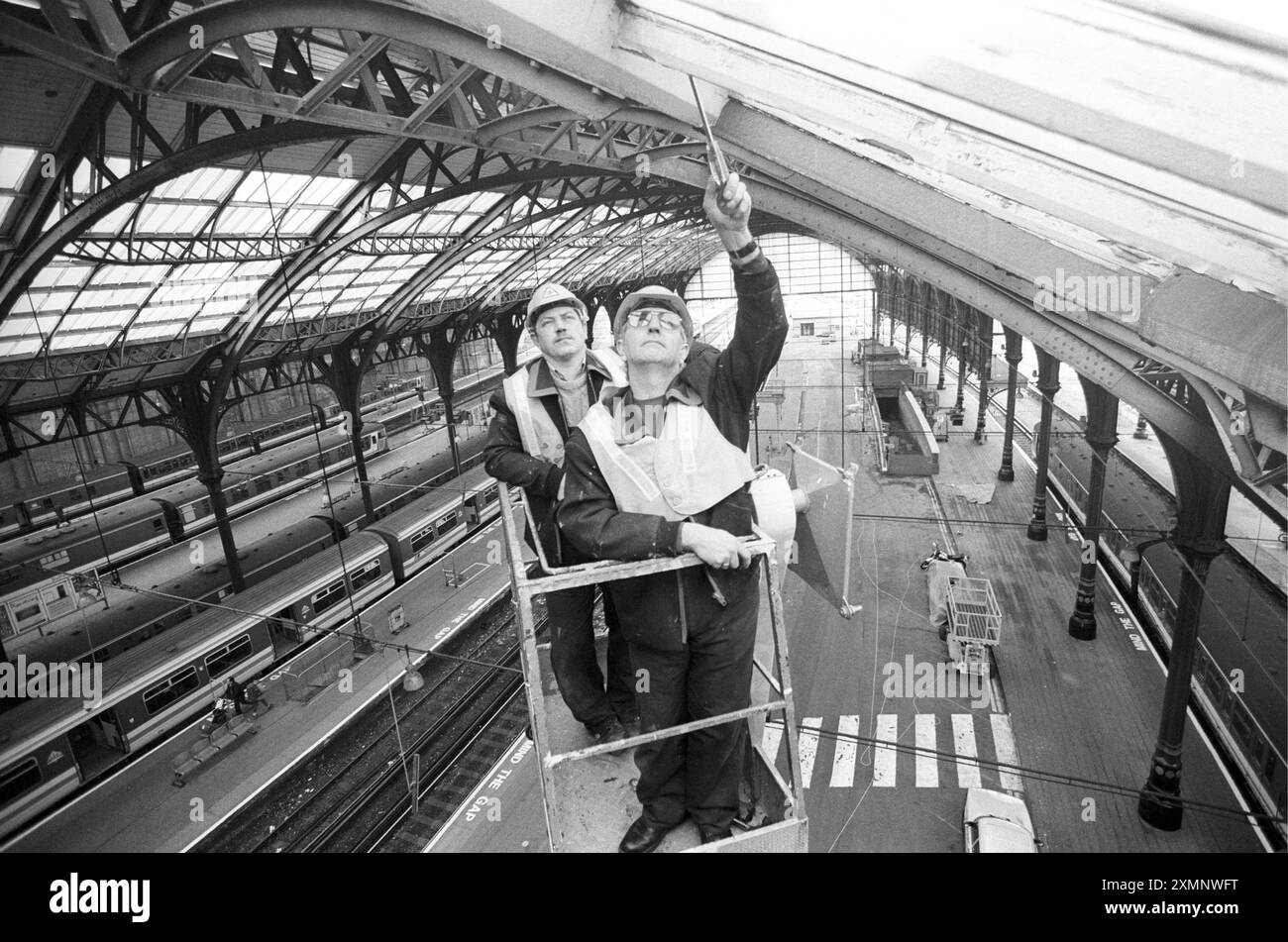 Maintenance men Ken Cooper and John Fulcher at work on the 7,000 panes ...