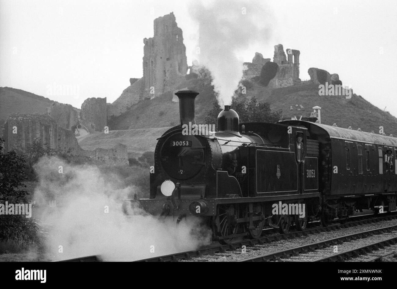 A Drummond design Class M7 Southern steam tank locomotive 30053 pulls ...