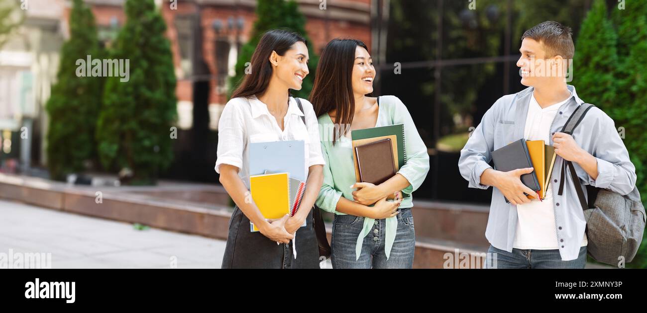 Handsome University Student Chatting With Two Female Classmates ...