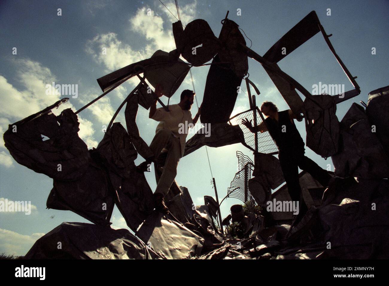 Sculptor Hamish Black with help from his brotherr Phelan Black with a ...