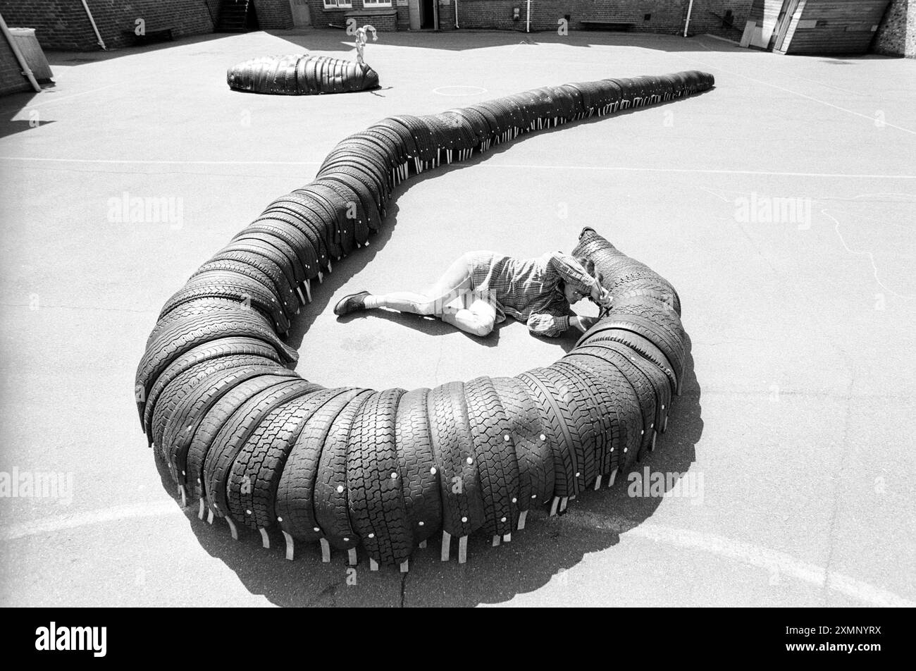 Sculptor Jane Lyster with her worm made from tyres18 May (no year ...