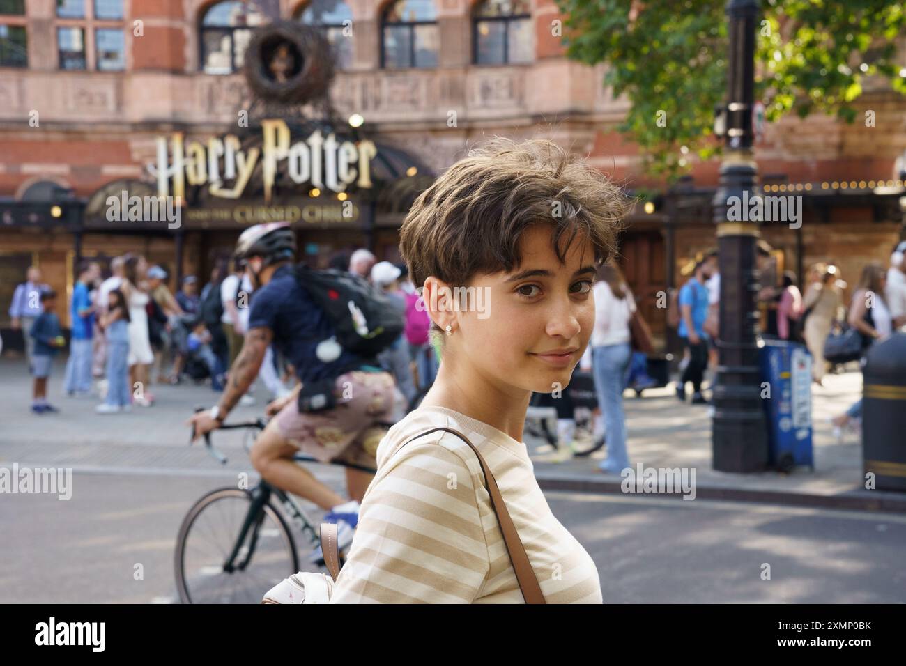 London, UK, july 18th 2024. Teenage girl in front of the facade of The ...