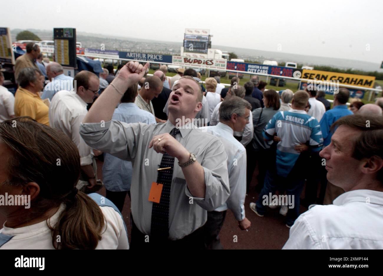 Picture by Roger Bamber: 7 August 2002: Brighton Races Bookies at work ...