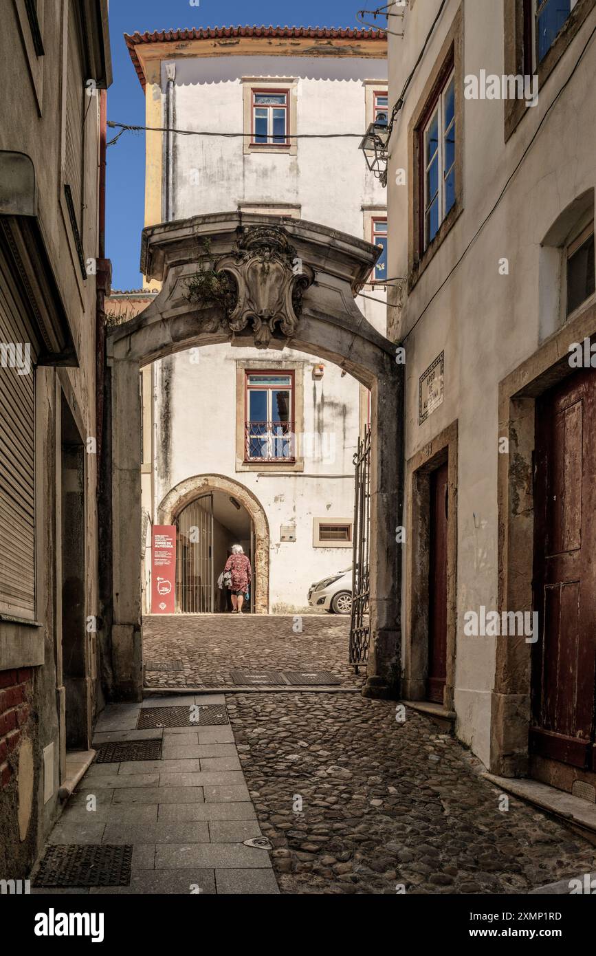 The Almedina Arch and Tower of a defensive nature in the old medieval ...
