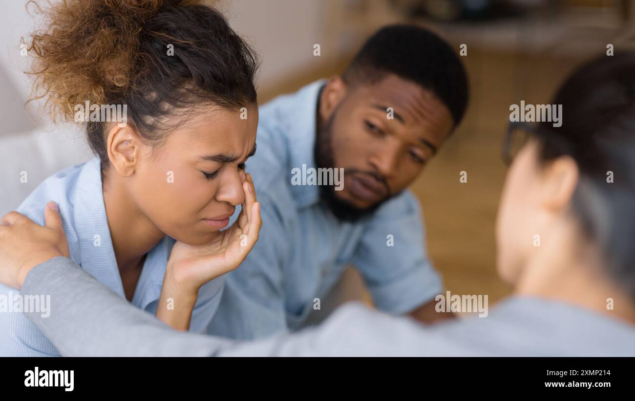 Counselor Comforting Desperate Afro Woman Crying At Couples Therapy ...