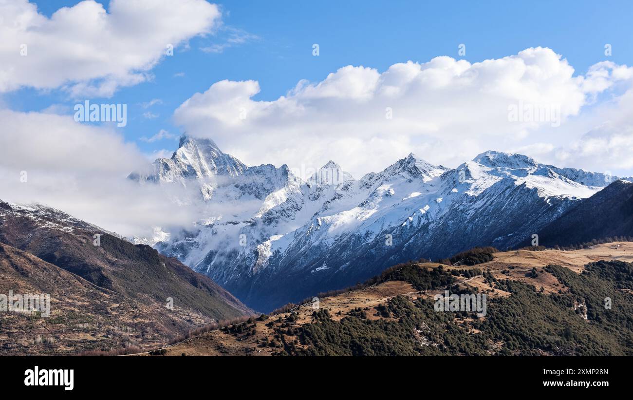 Panoramic view of Mount Siguniang or four sisters mountain featuring ...