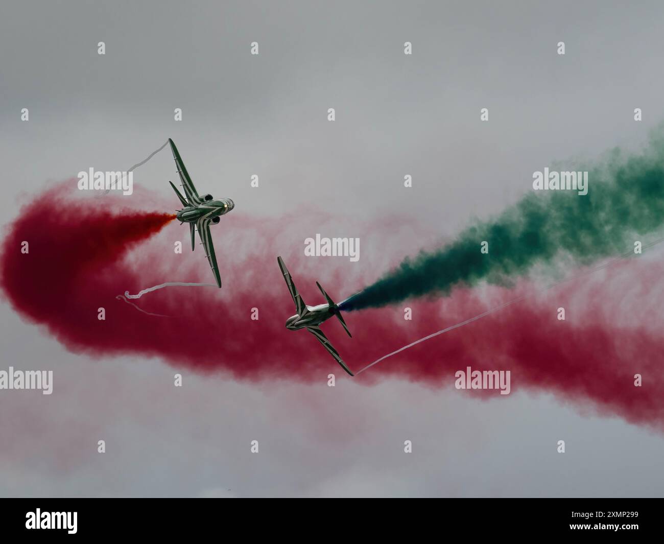 Two aircraft from the Saudi Hawks display team perform a crossing ...