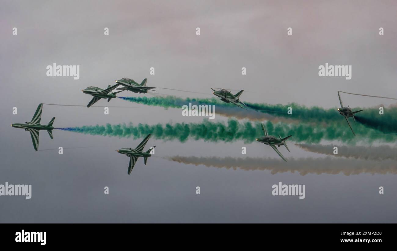 The Saudi Hawks display team perform with coloured smoke on at the 2024 ...