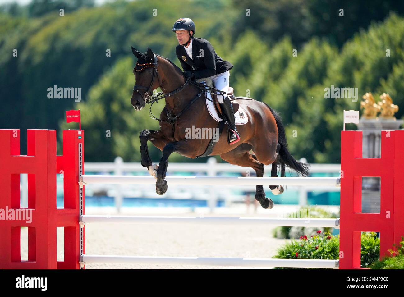 Germany's Michael Jung, riding Chipmunk Frh, competes in the equestrian ...