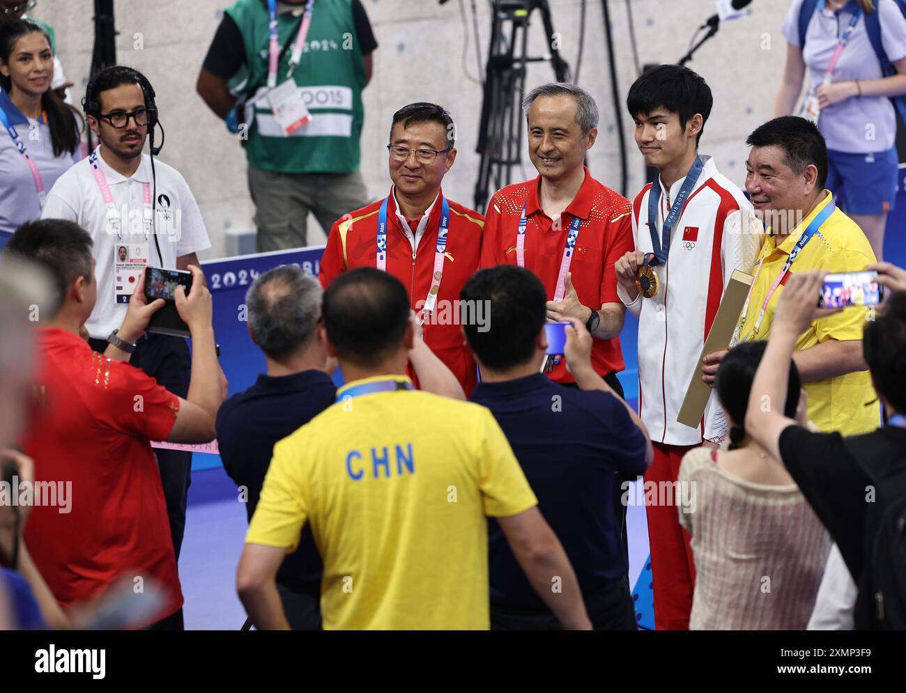 Chateauroux, France. 29th July, 2024. Gold medalist Sheng Lihao (2nd R ...