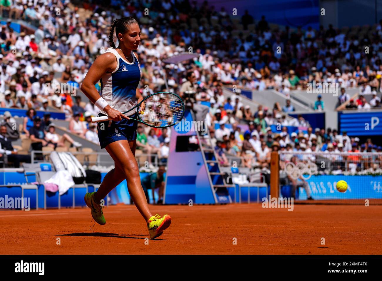 Diane Parry of France in action against Iga Swiatek of Poland during ...